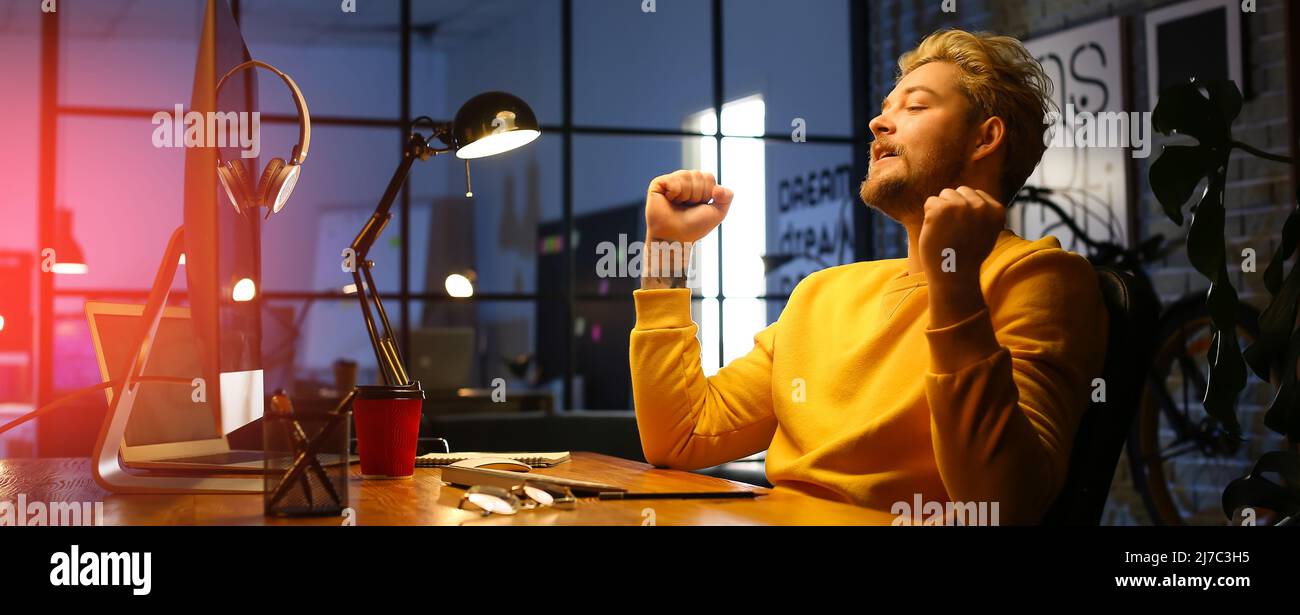 Happy programmer hi-res stock photography and images - Alamy