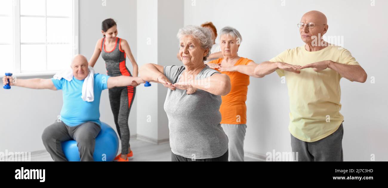 Elderly man doing physical exercises hi-res stock photography and ...