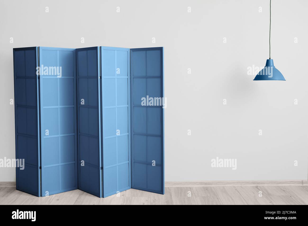 Blue folding room divider hi-res stock photography and images - Alamy