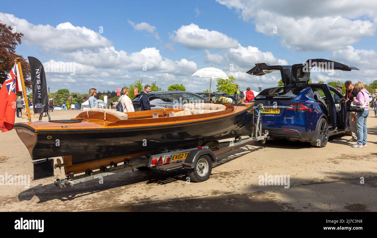 Tesla Model X towing a stylish boat named the Silent Adventure at the ...