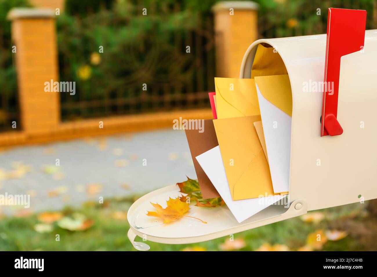 Mailbox with different letters outdoors Stock Photo - Alamy