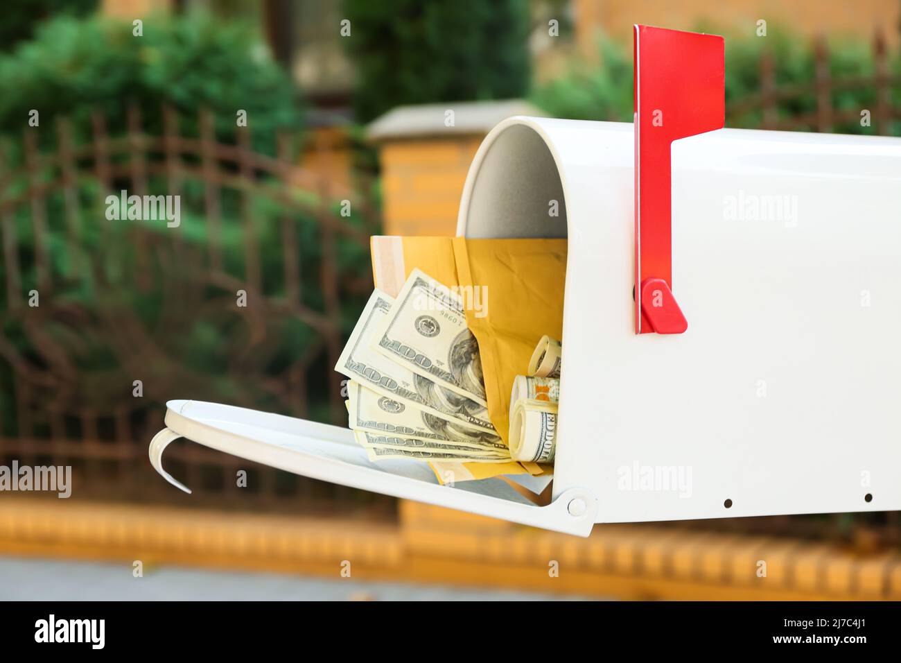 Vintage mailbox with money outdoors Stock Photo - Alamy