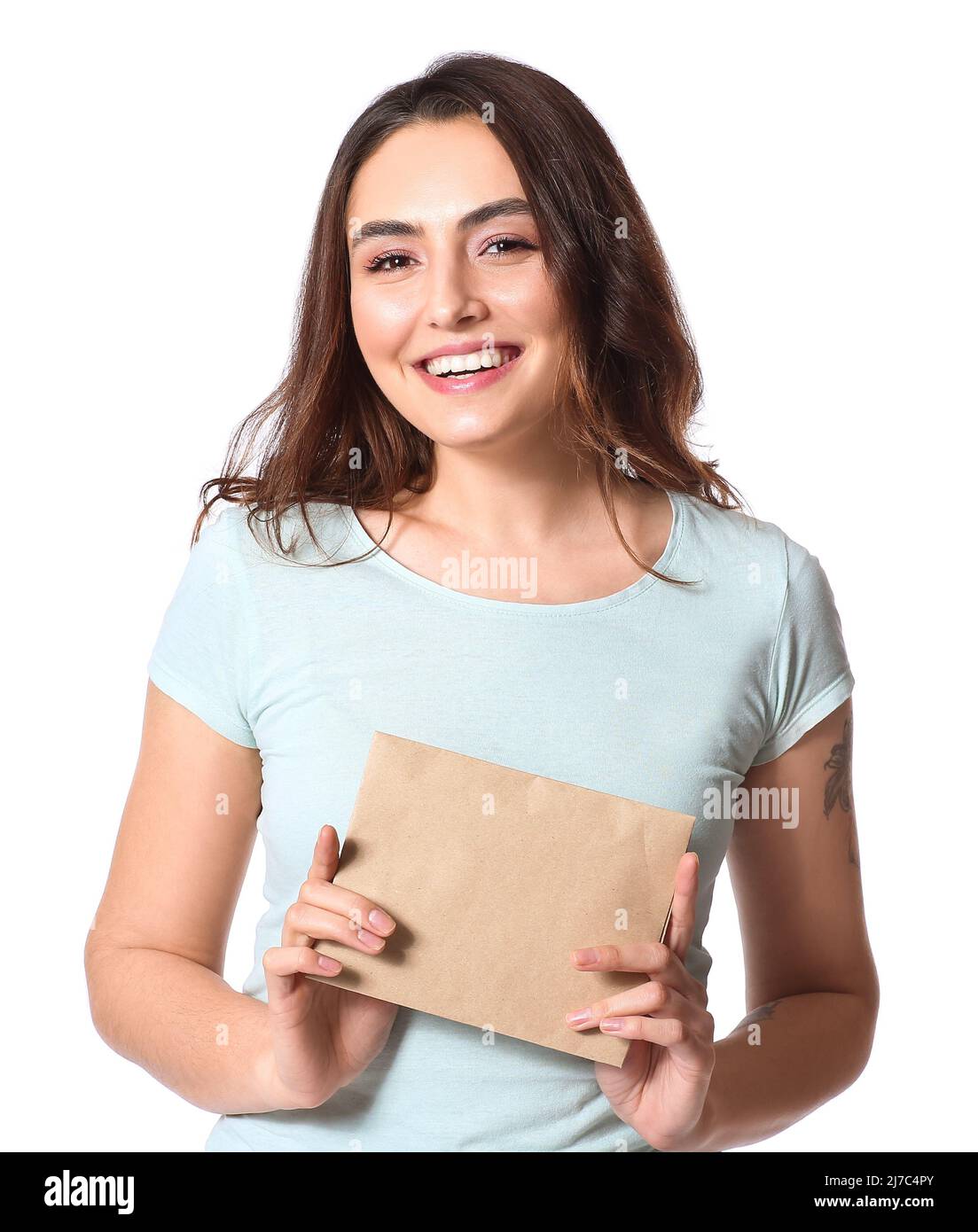 Young woman with envelope on white background Stock Photo - Alamy