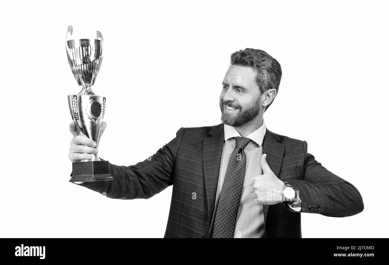 Reward for work. Happy ceo show thumbs up to golden cup. Reward and ...