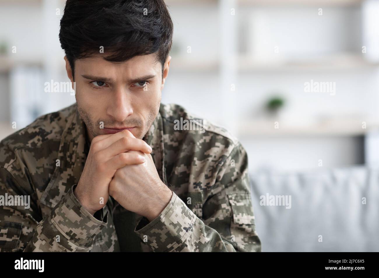 Thoughtful male soldier hi-res stock photography and images - Alamy
