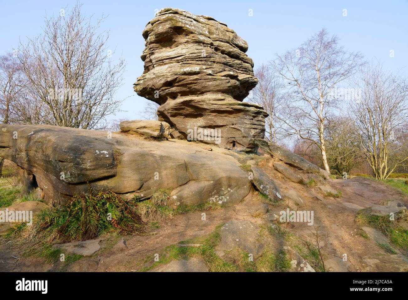 Gritstone outcrop heavily eroded by years of wind and rain Stock Photo ...