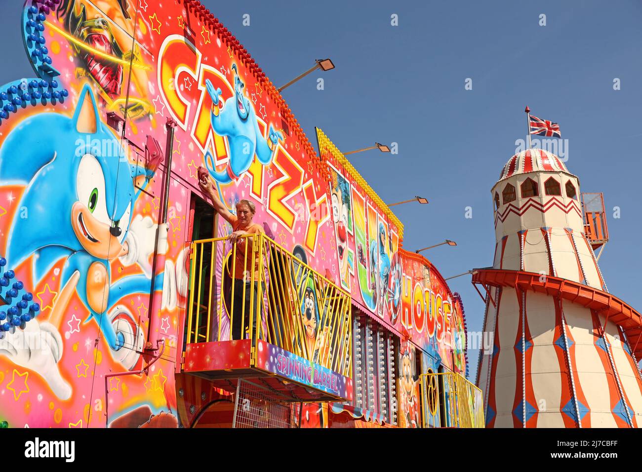 John-Henry Roper polishes the Crazy House, beneath blue skies at the ...