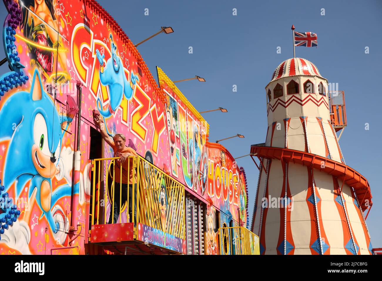 John-Henry Roper polishes the Crazy House, beneath blue skies at the ...