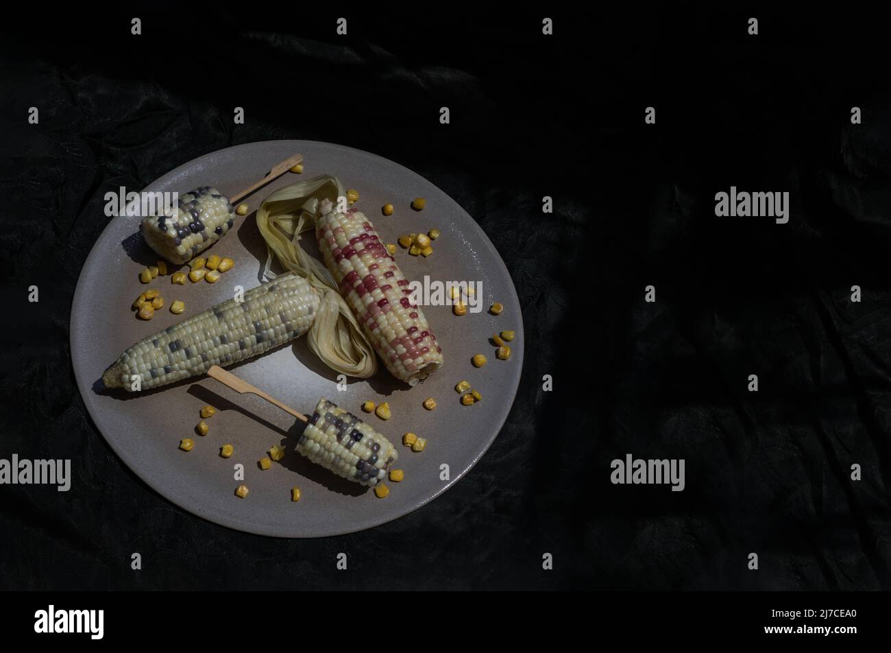 Fresh waxy corn or Sweet glutinous corn and Corn kernels over Round ...