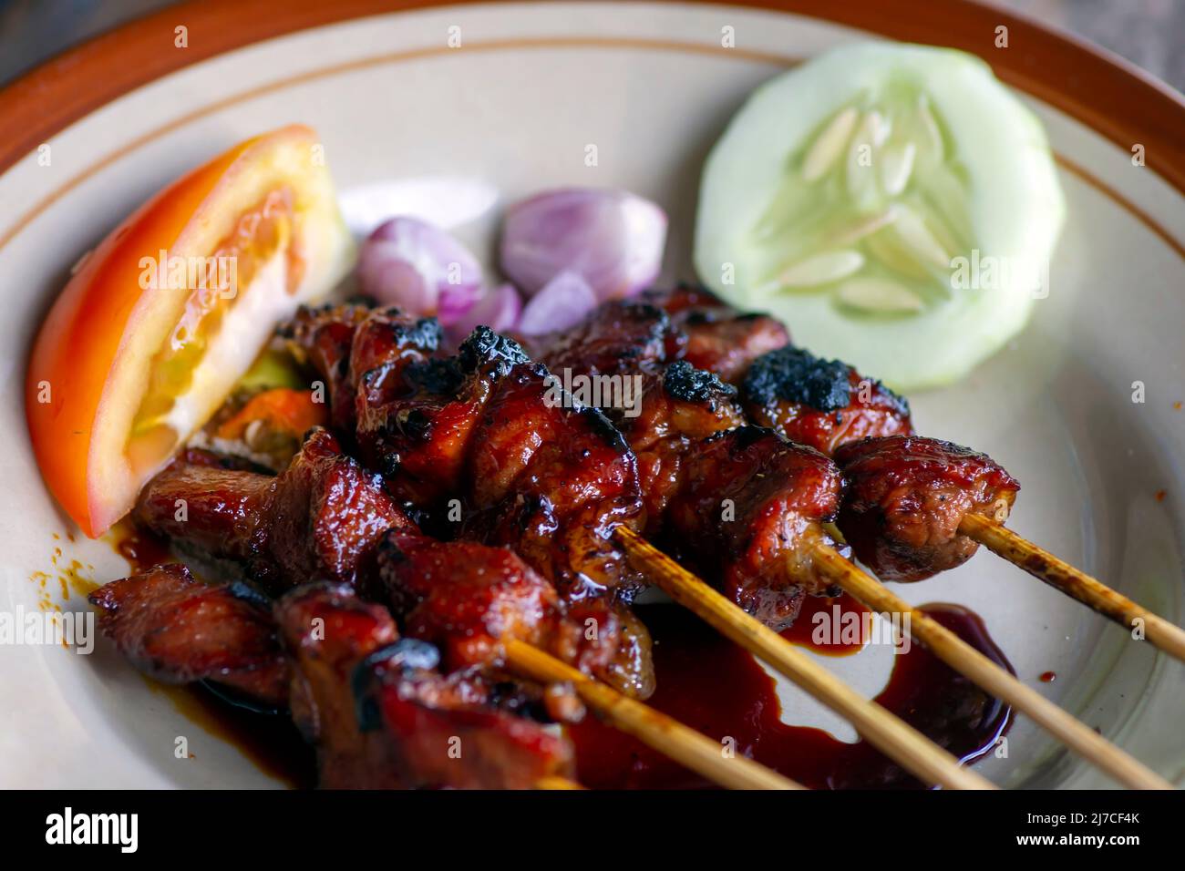 Goat Satay, a traditional satay from Yogyakarta, Indonesia, in shallow ...