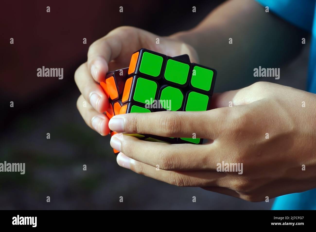 Child solving rubiks cube hi-res stock photography and images - Alamy