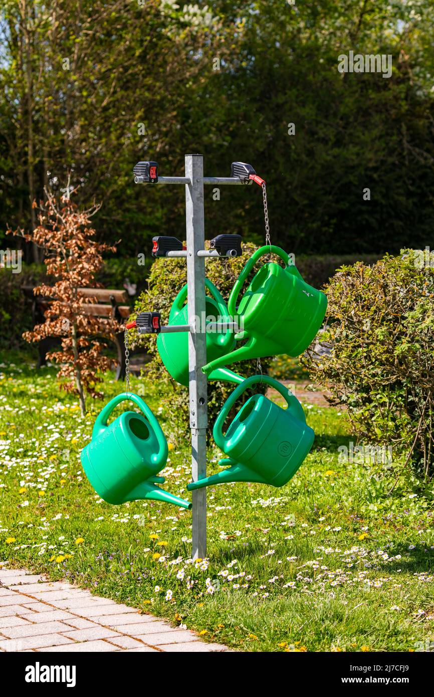 Locked watering cans hi-res stock photography and images - Alamy