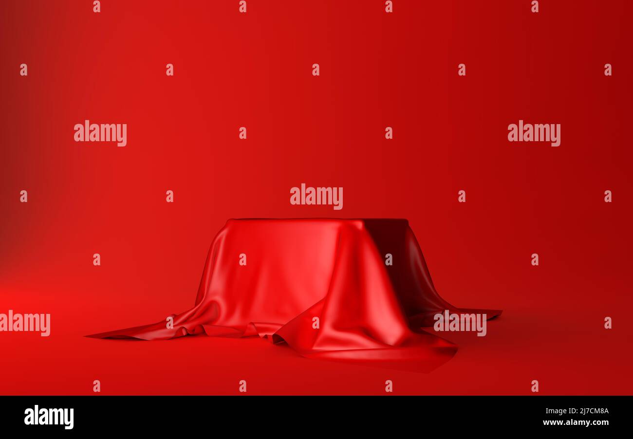 Realistic box covered with red silk cloth isolated on a red background ...