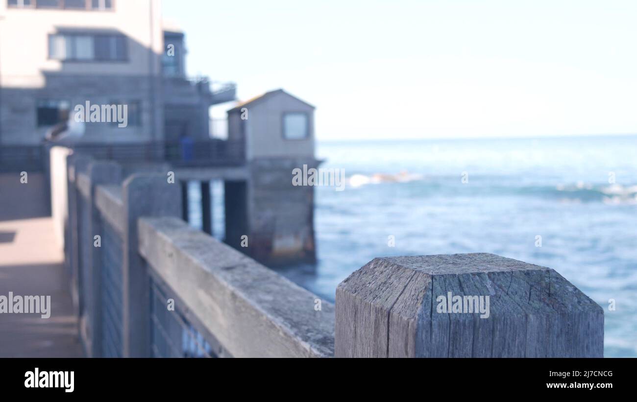 Waterfront wooden boardwalk in Monterey, California USA. Beachfront ...