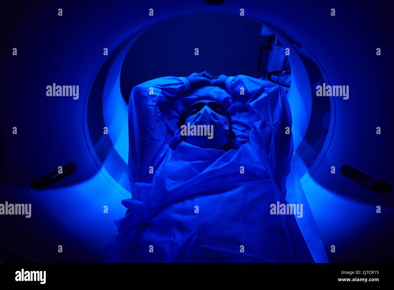 Male patient doing MRI in modern clinic Stock Photo - Alamy