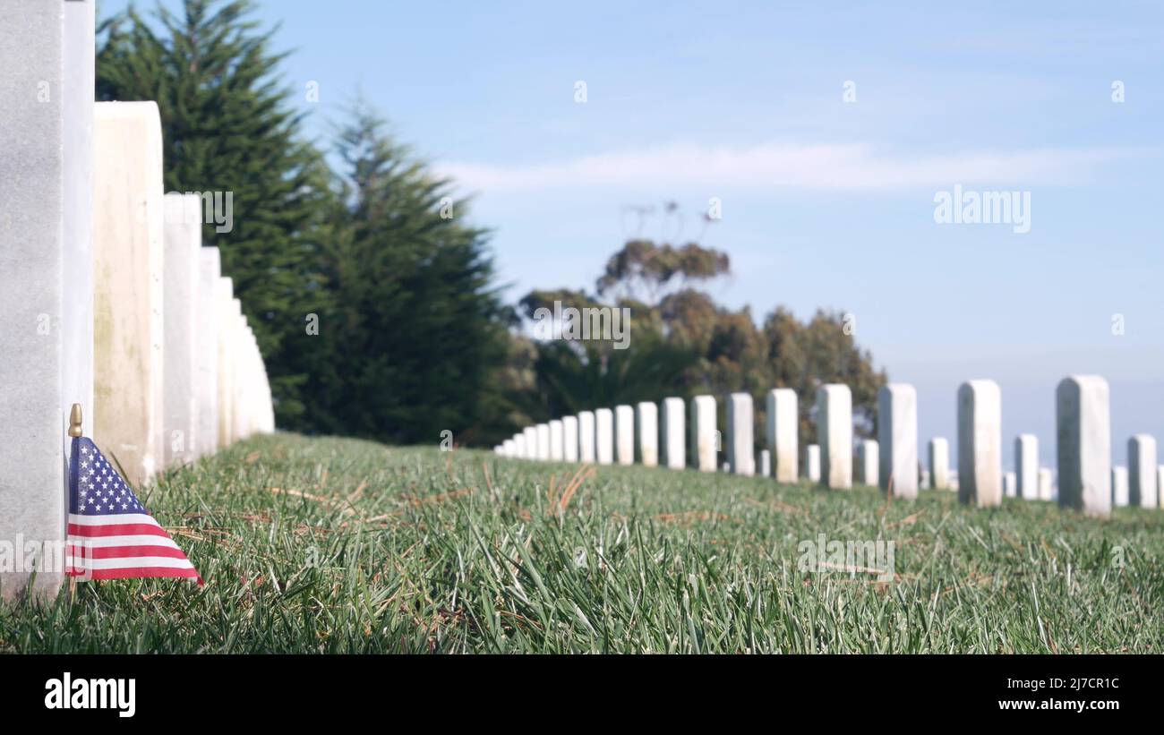 Tombstones and american flag, national memorial cemetery, military ...