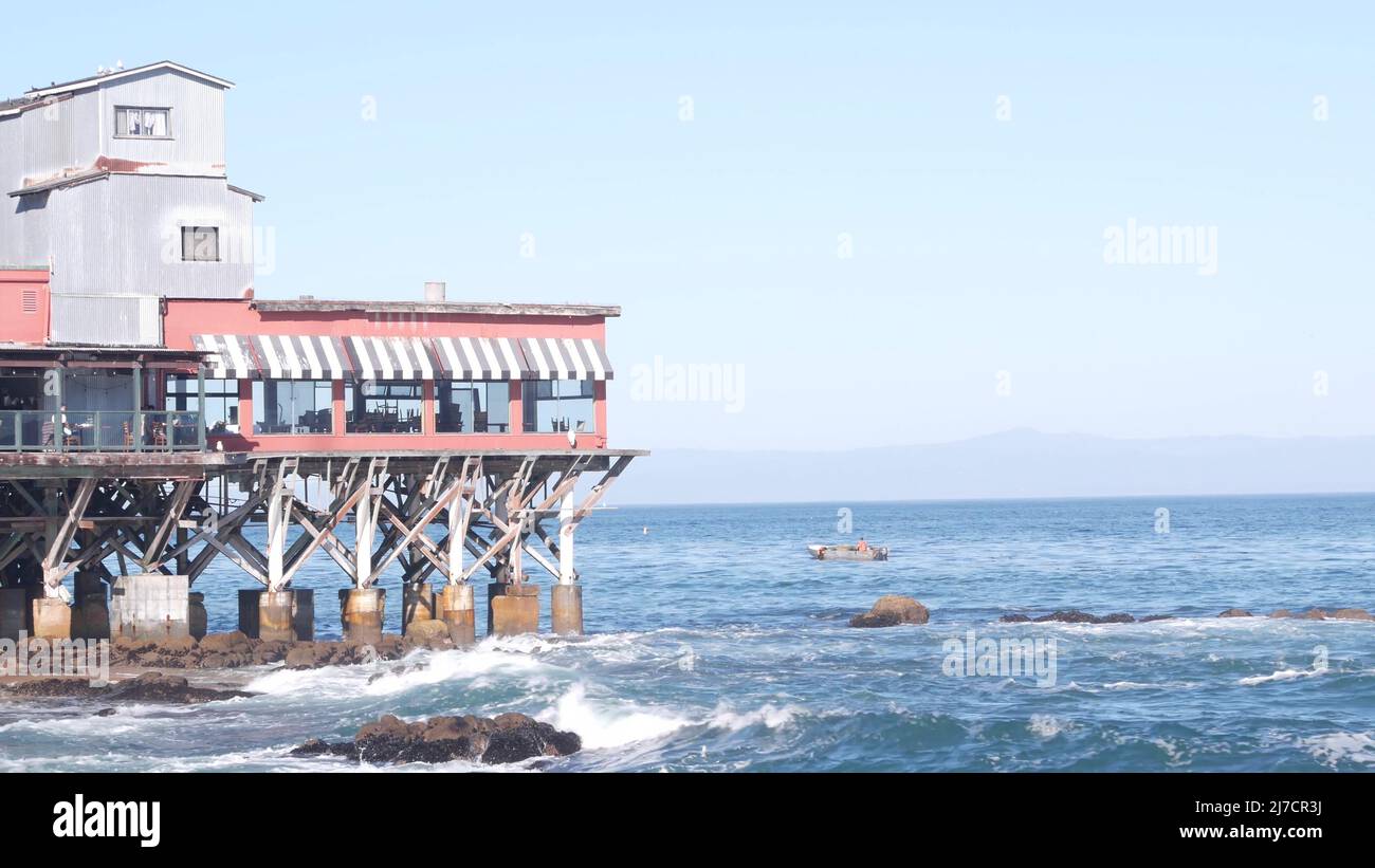 Waterfront beachfront cafe on piles, pillars or pylons, Monterey beach ...