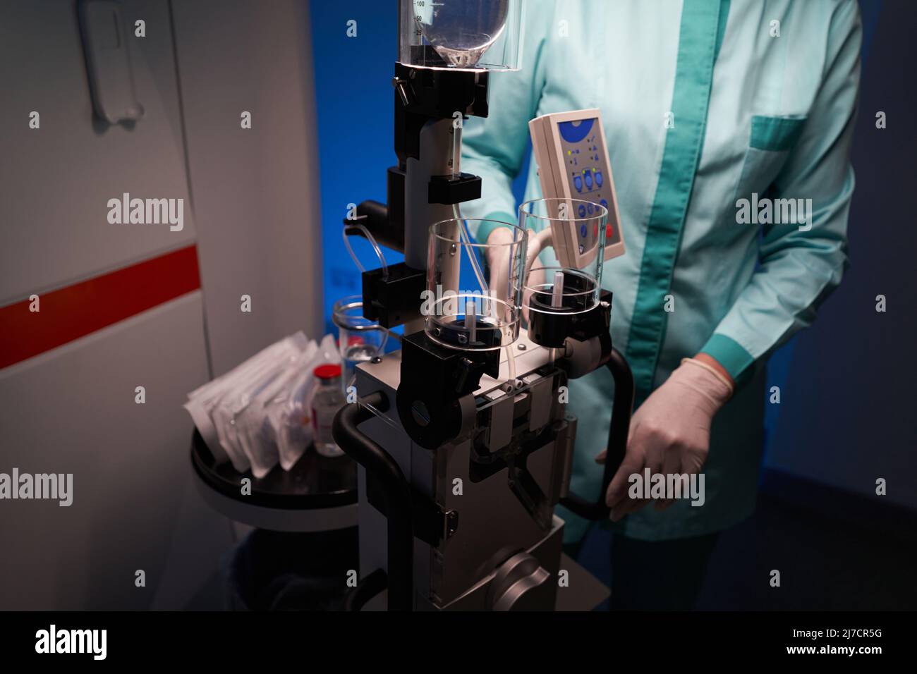 Female doctor standing near modern medical equipment Stock Photo - Alamy