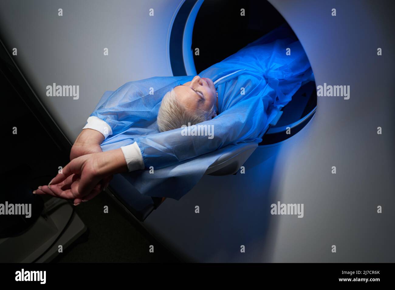 Mature woman visiting clinic for MRI procedure Stock Photo - Alamy
