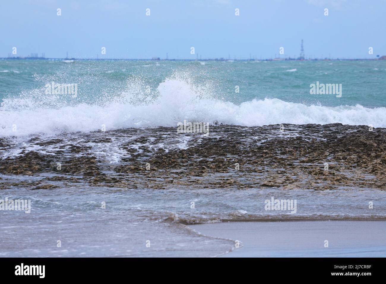 Waves crash against rock surf hi-res stock photography and images - Alamy