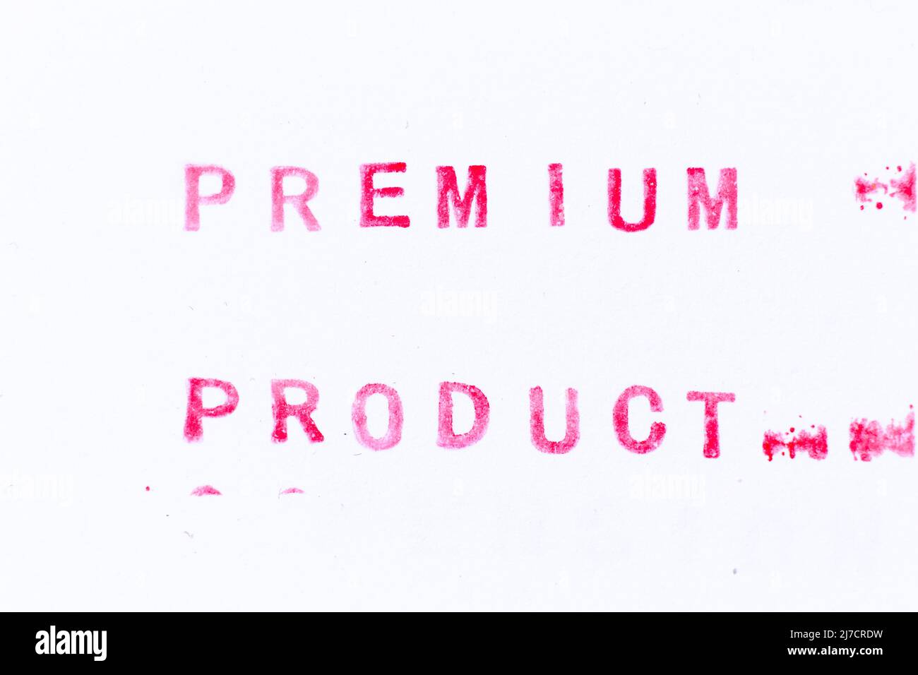 Red color ink rubber stamp in word premium product on white paper ...