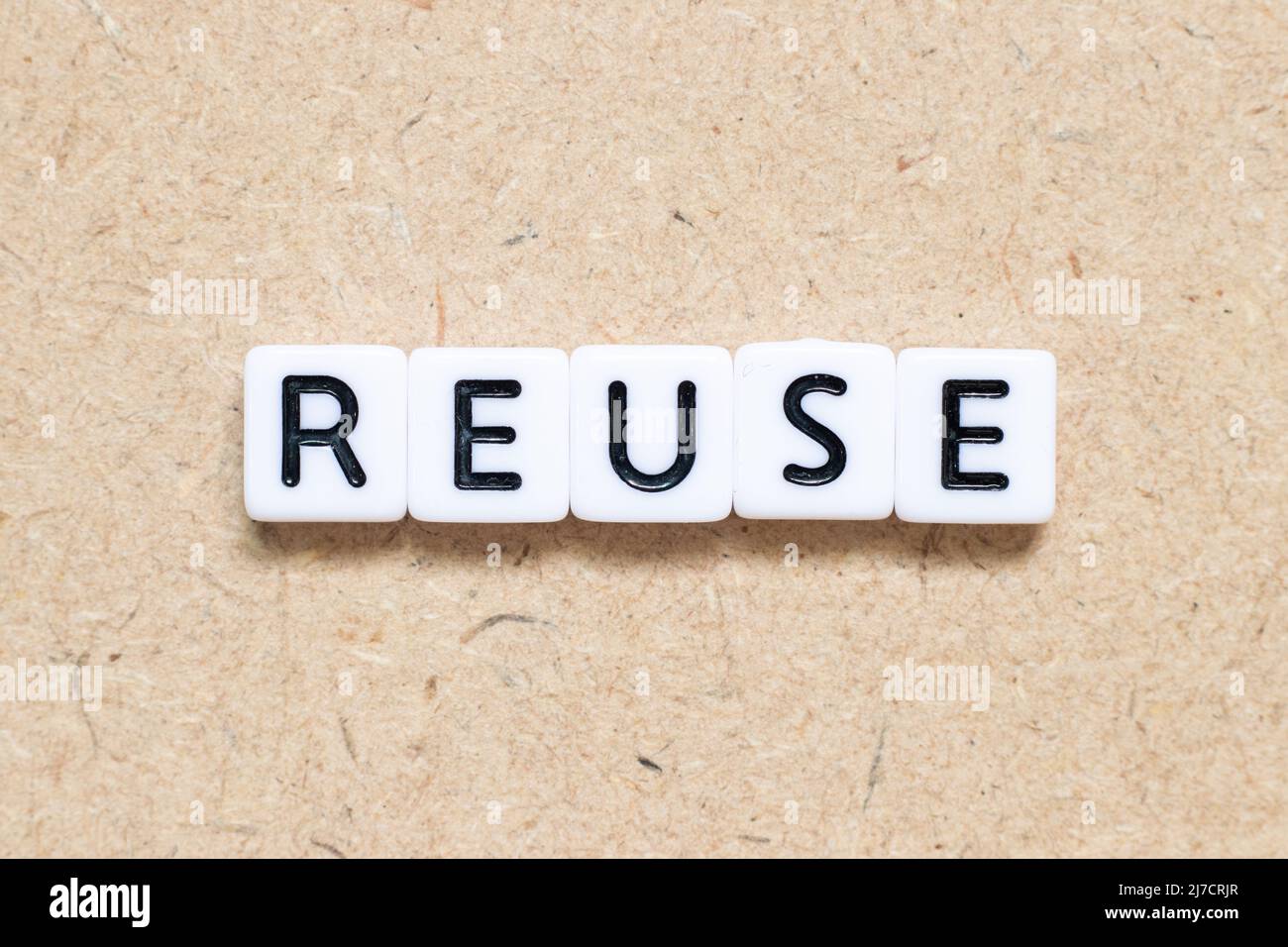 White tile alphabet letter with word reuse on wood background Stock Photo - Alamy