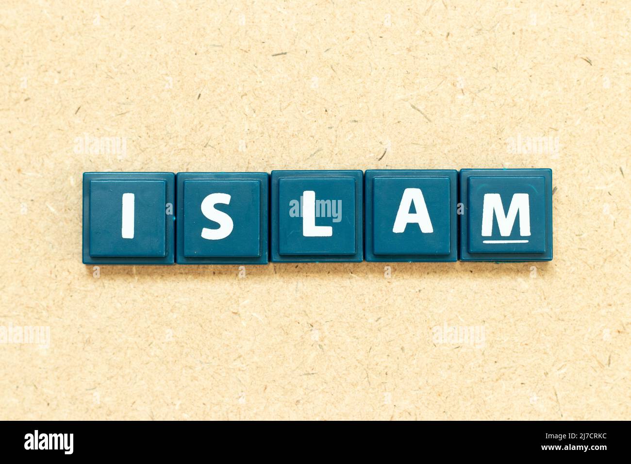 Tile alphabet letter in word islam on wood background Stock Photo - Alamy