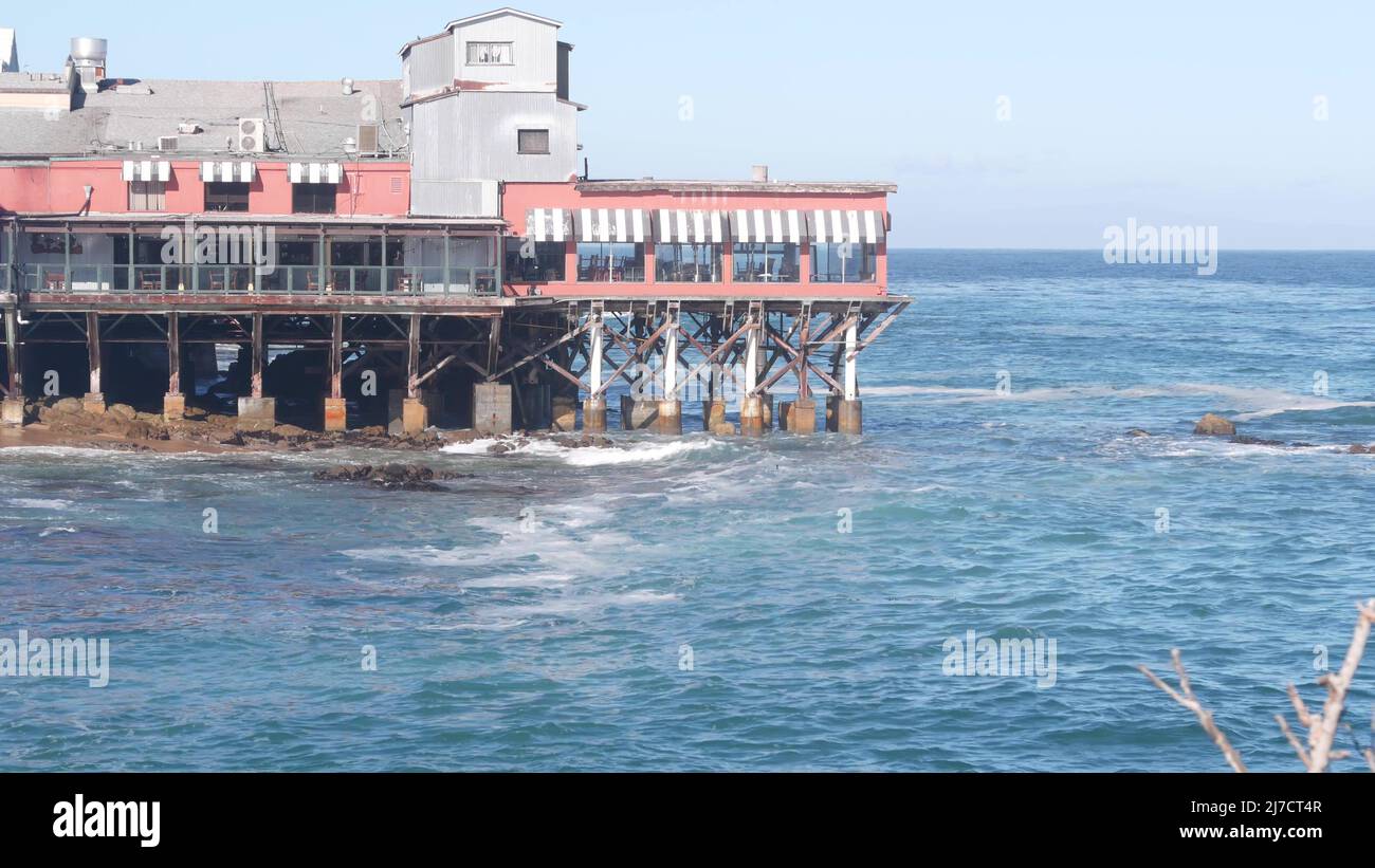 Waterfront beachfront cafe on piles, pillars or pylons, Monterey beach ...
