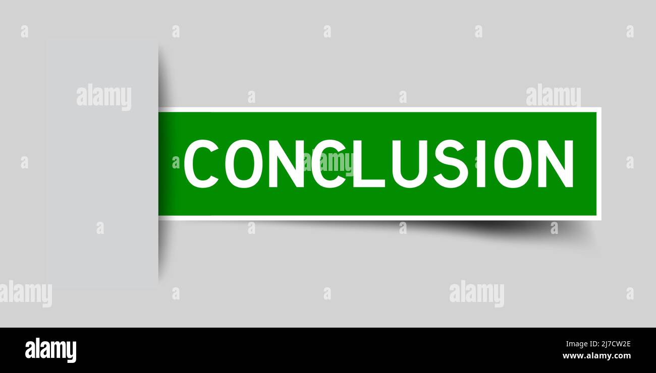 Inserted green color label sticker with word conclusion on gray ...
