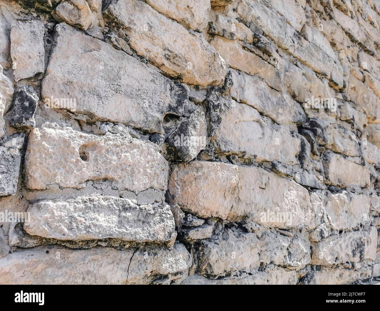 Texture and pattern of the ancient Tulum ruins Mayan site with temple ...