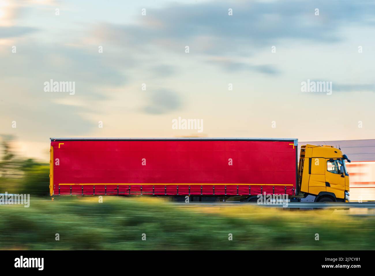 Truck with tarpaulin semi-trailer for general cargo traveling fast on ...