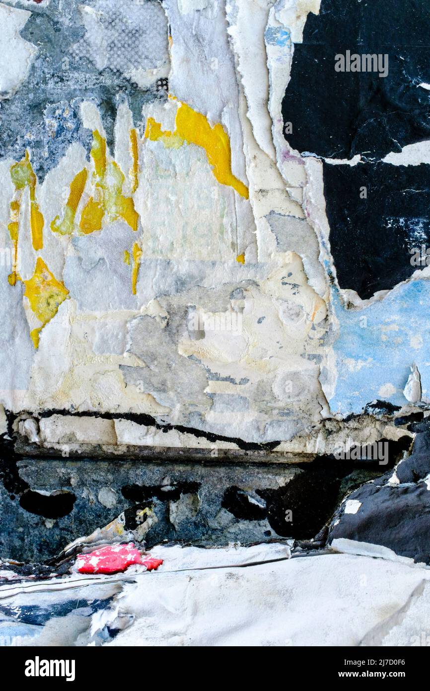 Torn posters creating a décollage effect, London, UK Stock Photo - Alamy