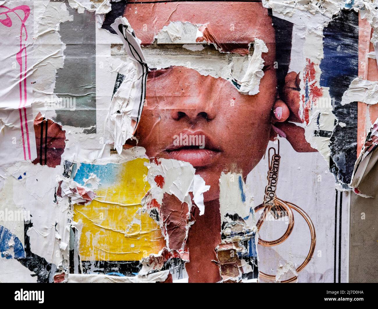 Torn posters creating a décollage effect, London, UK Stock Photo - Alamy