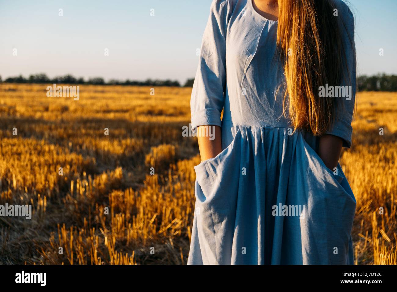 Physical and mental well-being. Faceless portrait of woman in linen ...
