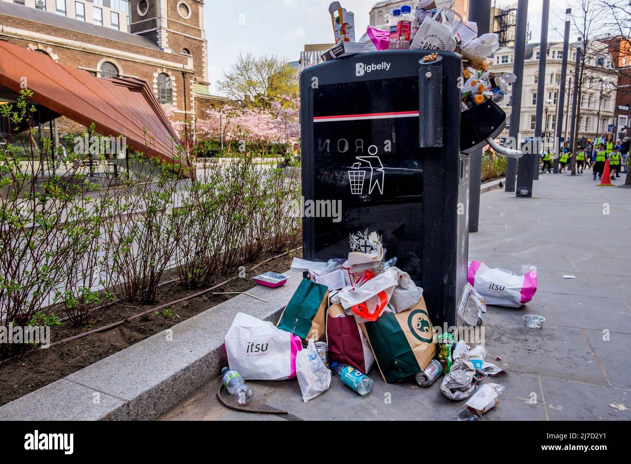 Overflowing public litter bin in the City of London, UK Stock Photo - Alamy
