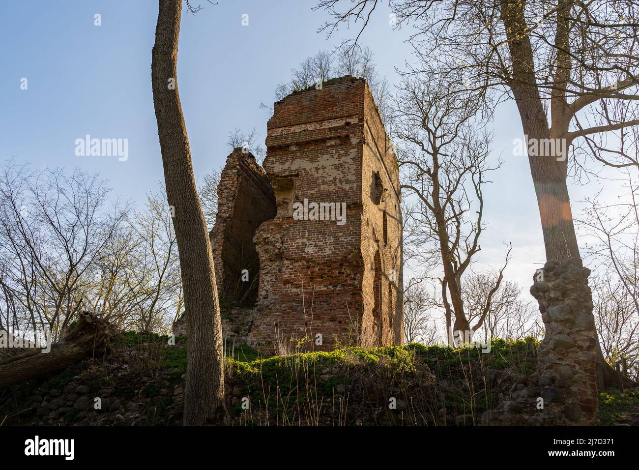 Ruin of an abandoned fortress from the middle ages in Europe. Weathered ...