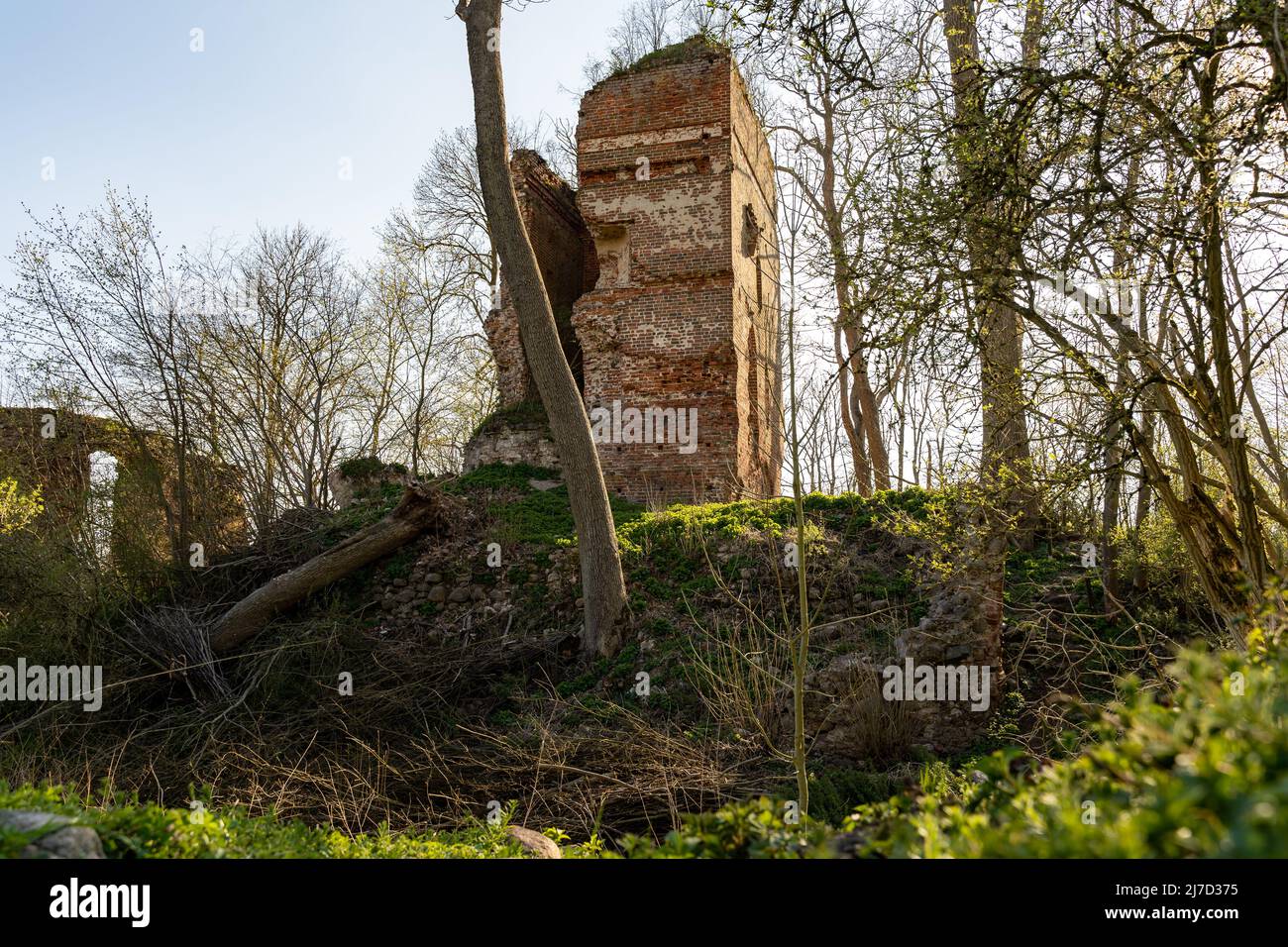 Ruin of an abandoned fortress from the middle ages in Europe. Weathered ...
