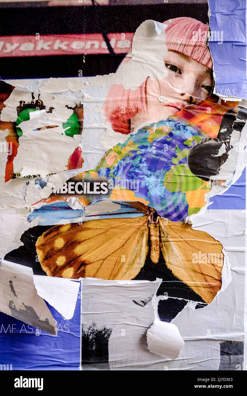 Torn posters creating a décollage effect, London, Uk Stock Photo - Alamy