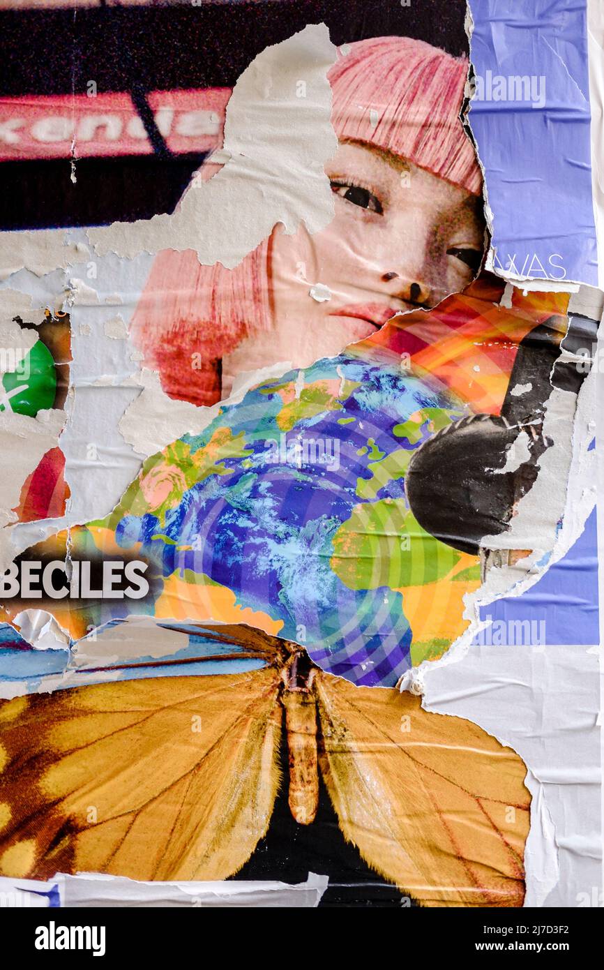 Torn posters creating a décollage effect, London, Uk Stock Photo - Alamy