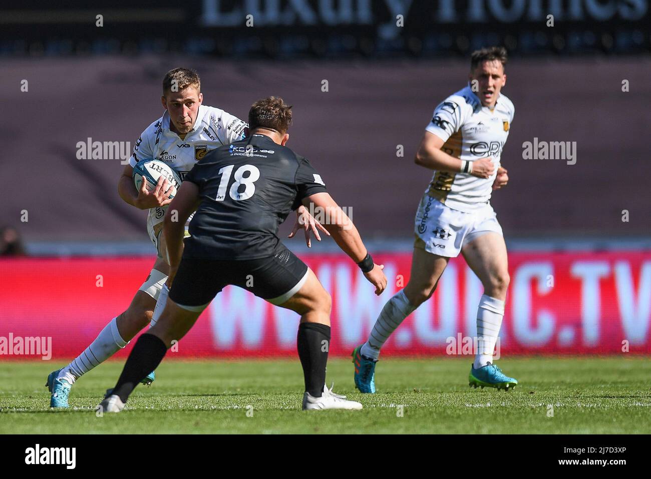 Harri Keddie of Dragons, in action during the game takes on Tom Botha ...
