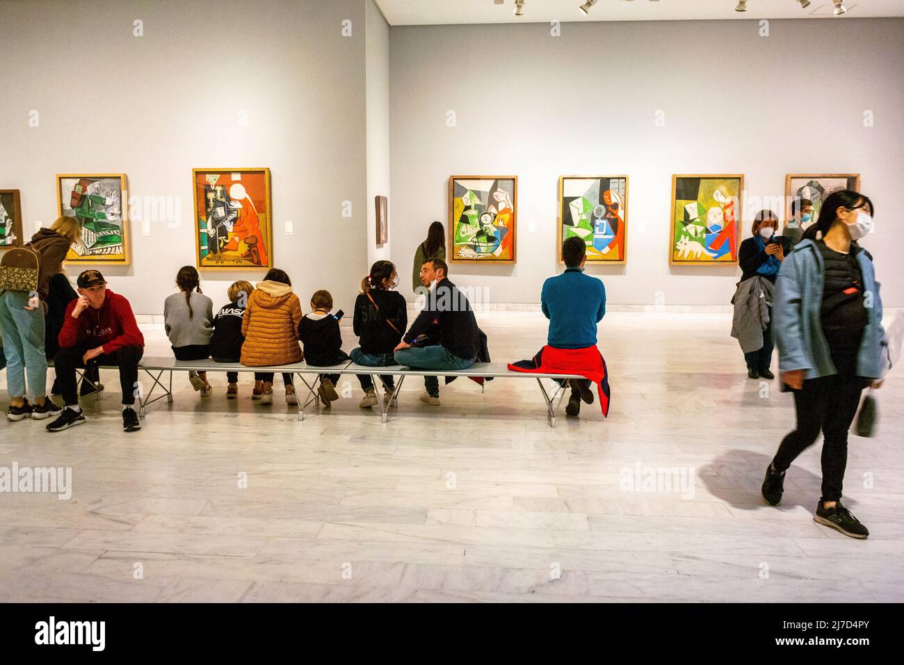 Barcelona, Spain, Medium Crowd people, Sitting from Behind, Young ...