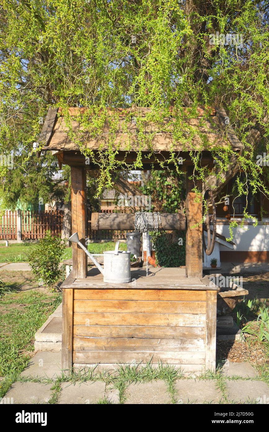 Well and tree hi-res stock photography and images - Alamy