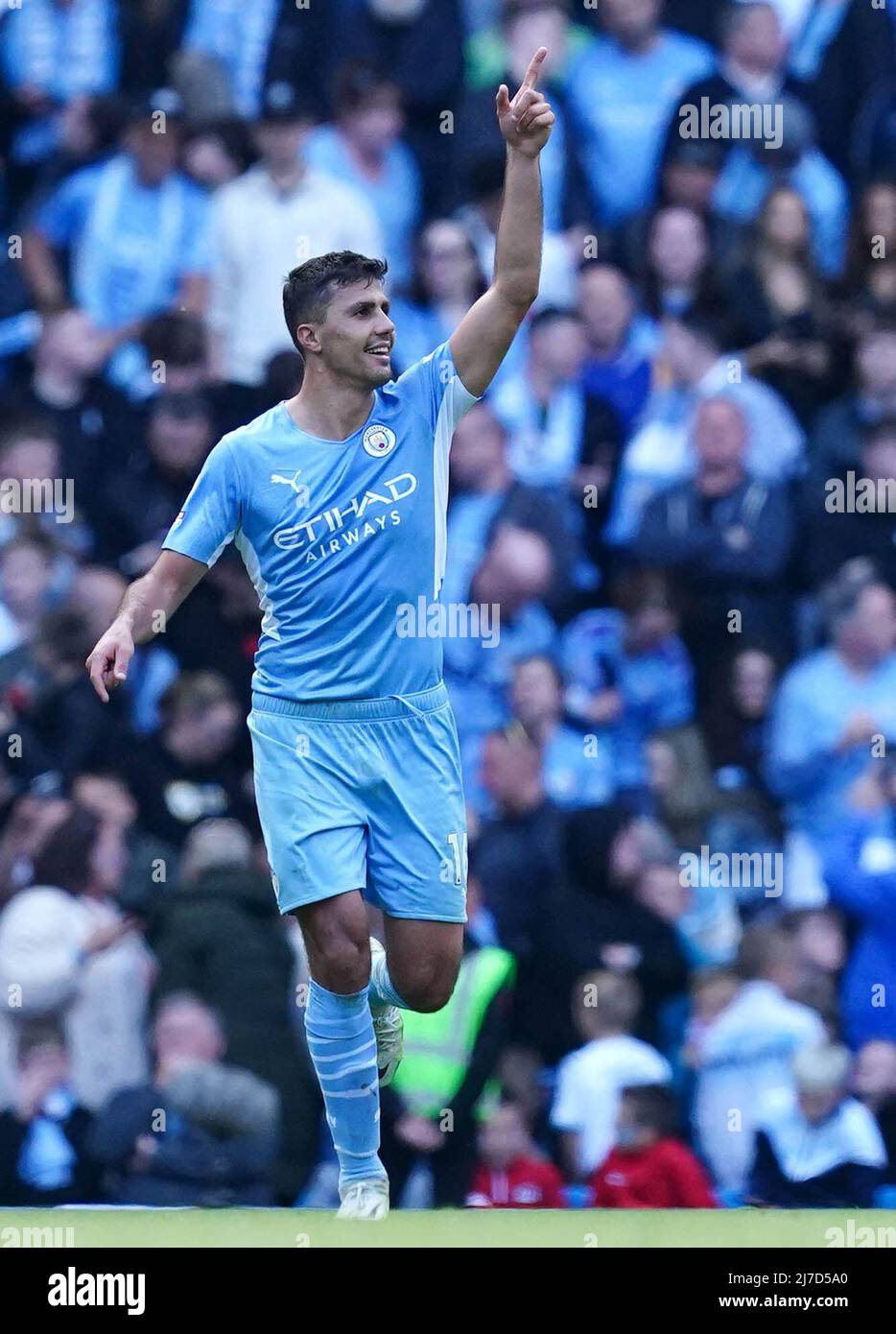 Manchester City's Rodri celebrates after scoring his sides third goal ...