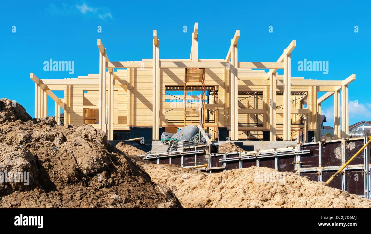 Construction of a wooden house from glued profiled timber in the spring ...