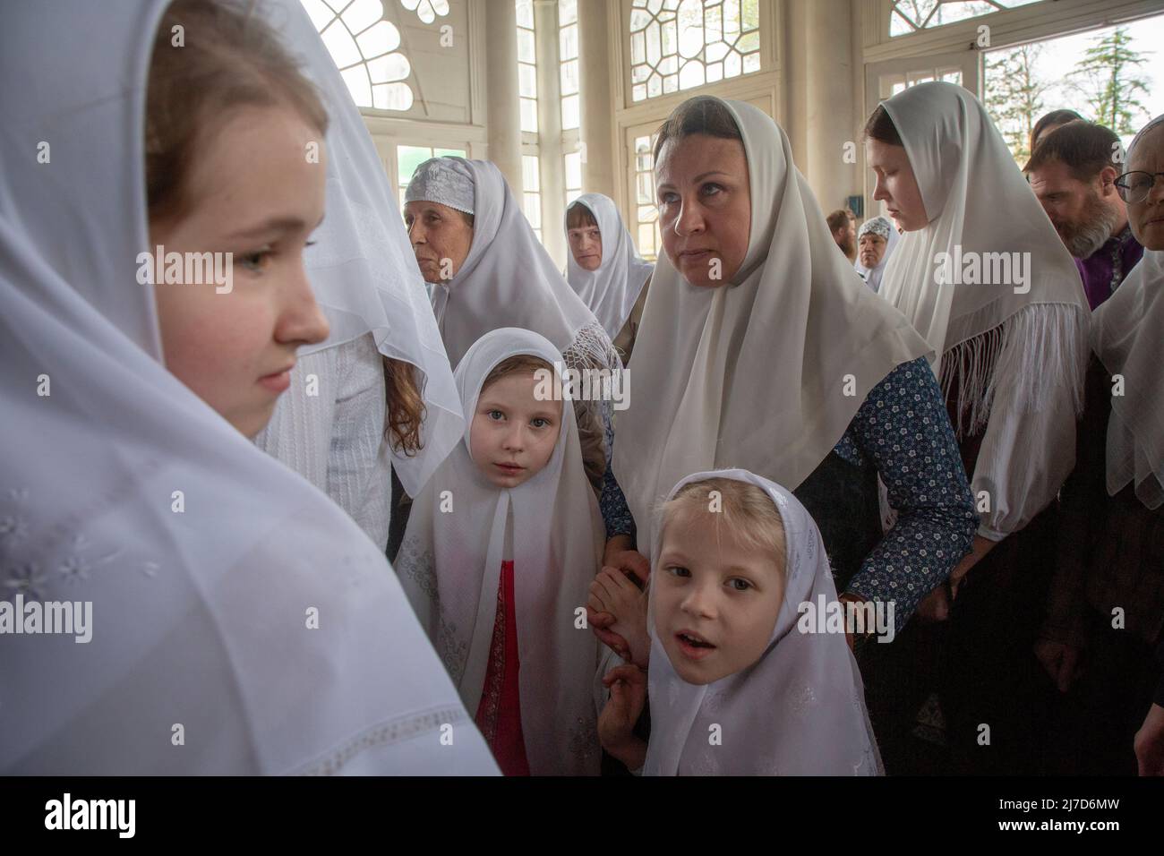 Moscow, Russia. 8th May, 2022. Believers before a cross procession ...