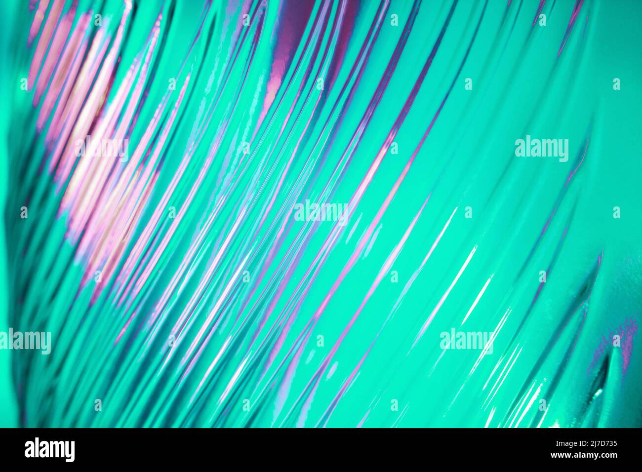 Abstract glass background. Texture of wavy glass illuminated with multi ...
