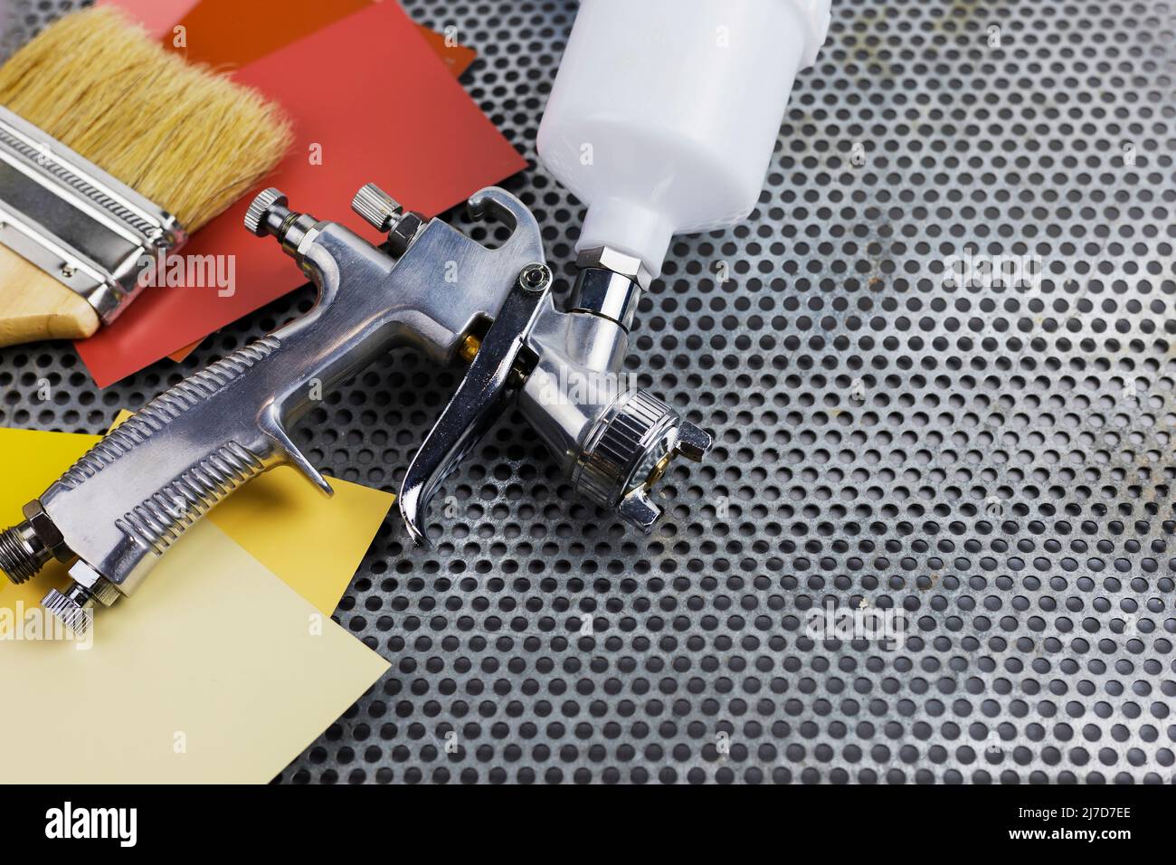 paint spray gun at work at the workplace in the workshop Stock Photo ...