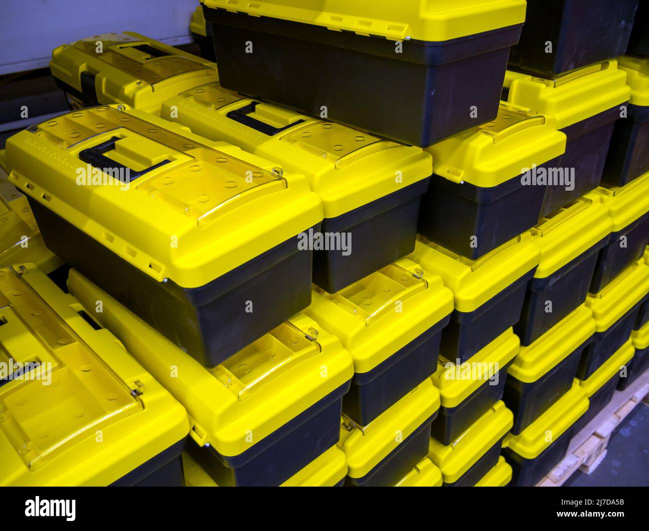 Rack with plastic boxes for tools Stock Photo - Alamy