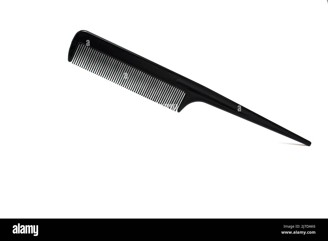 Close up profile view of black comb straighten long hair with pointed ...