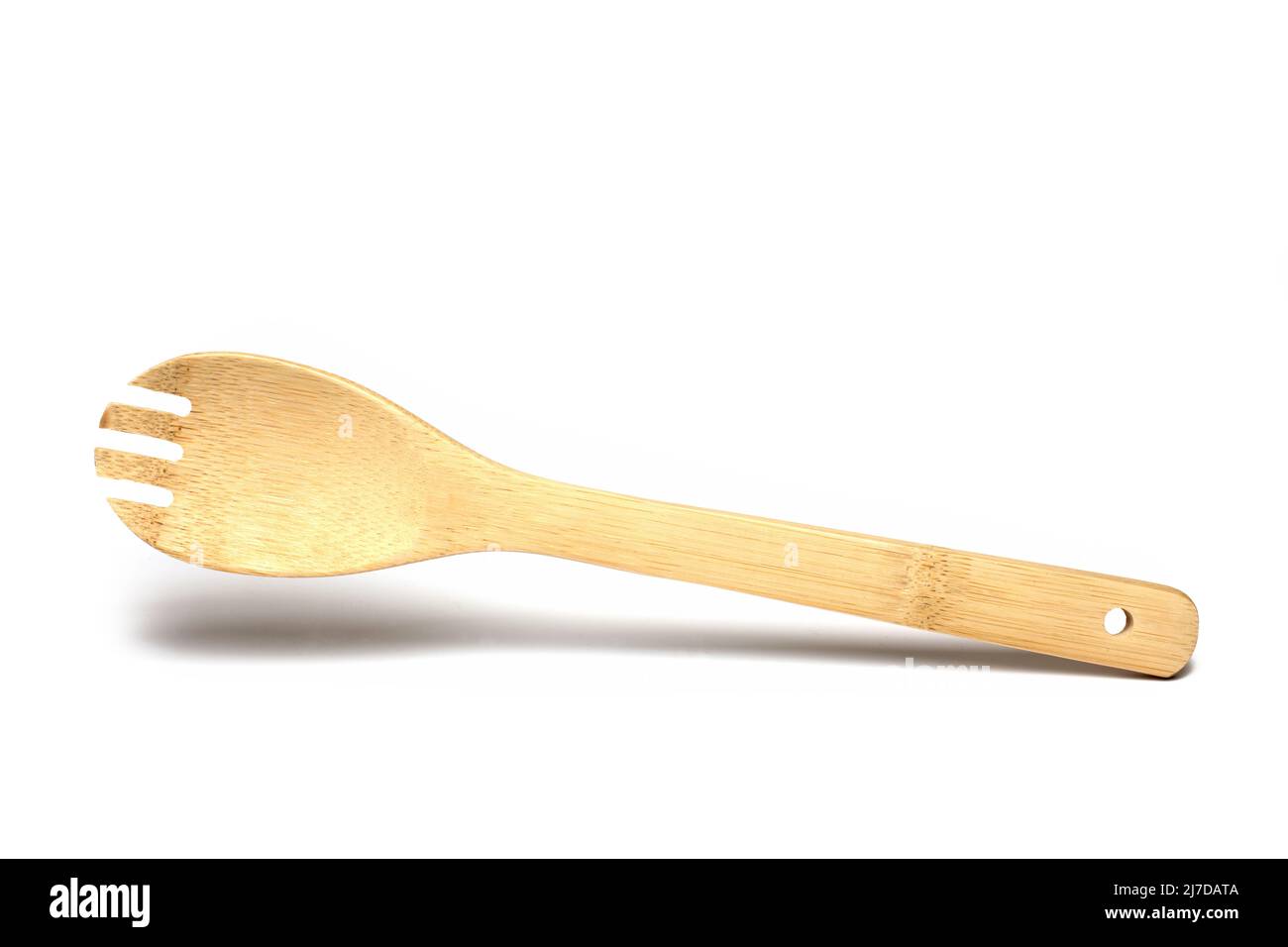 Close up of a bright wooden bamboo wooden salad fork wooden kitchen ...